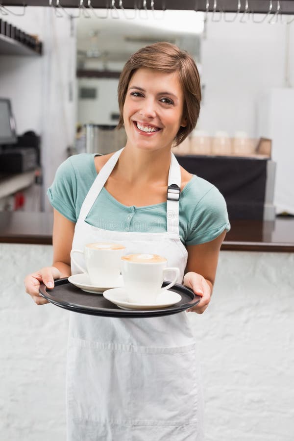 Waitress Holding Tray with Cappuccinos Stock Image - Image of owner ...