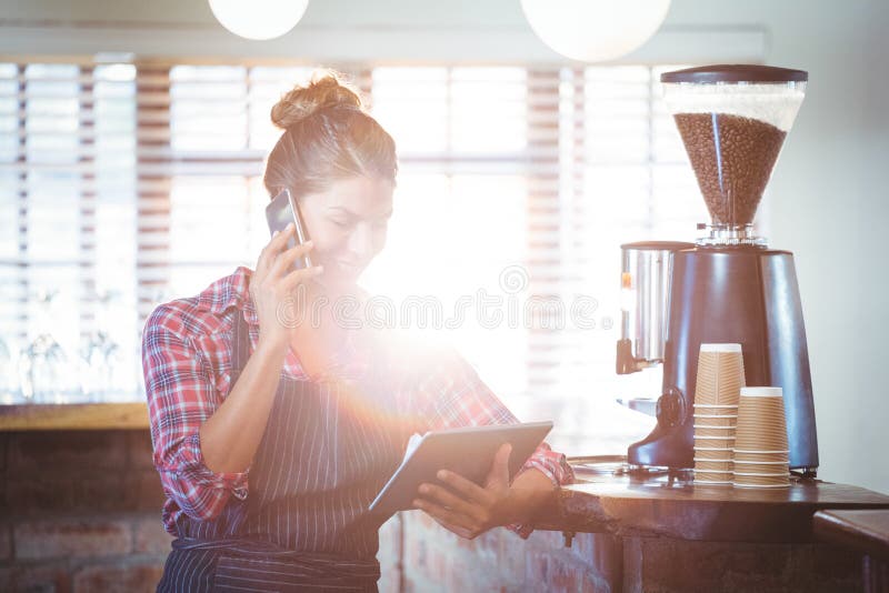 Waitress Making a Phone Call Stock Image - Image of happy, cheerful ...