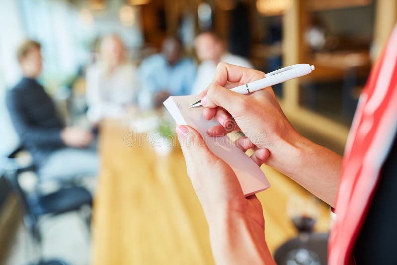 Waitress with Notepad Takes Order Stock Photo - Image of bistro ...