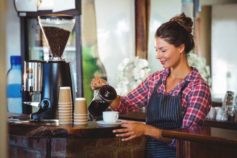 Waitress Pouring Coffee into Cup Stock Image - Image of confidence ...