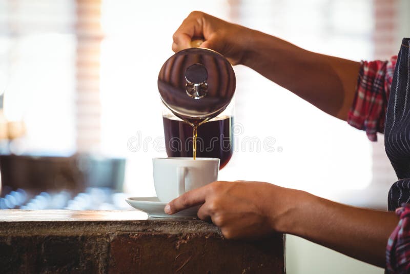 Waitress Preparing a Coffee Stock Photo - Image of preparing, pouring: 73243982