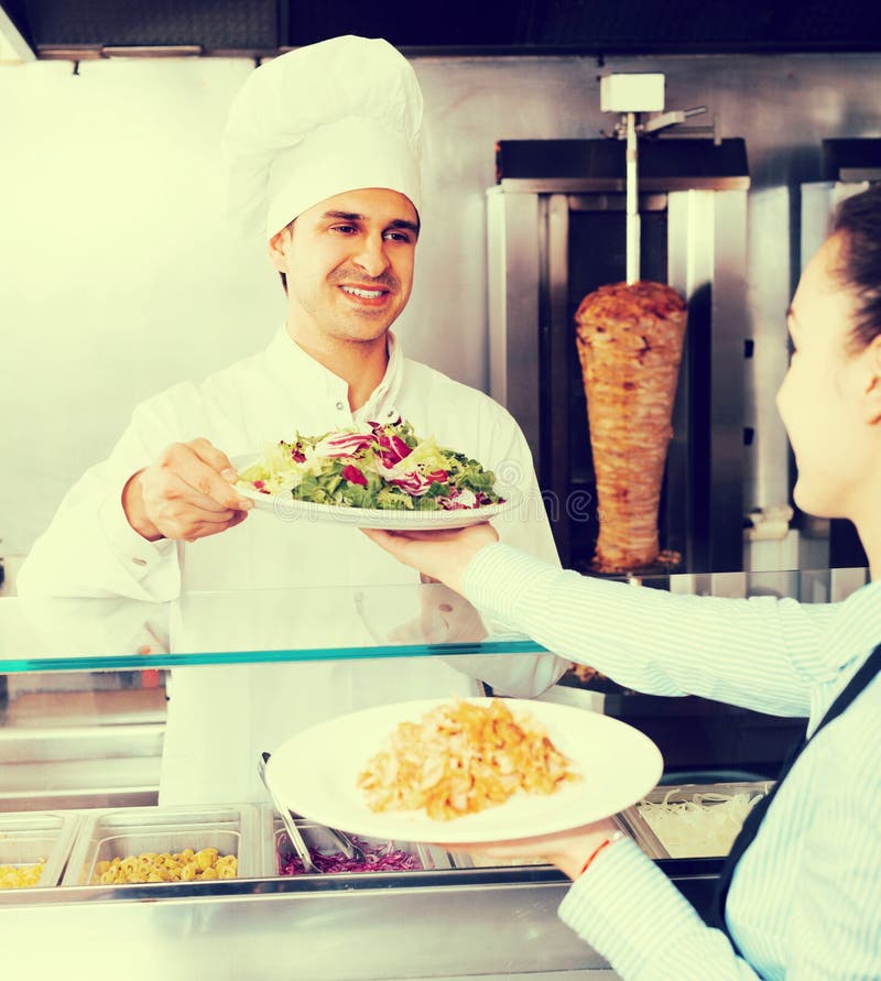Waitress Receiving Order with Kebab from Chef Stock Image - Image of ...