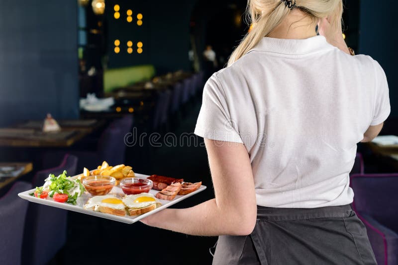 Waitress Serving Breakfast at a Restaurant Stock Photo - Image of meal ...