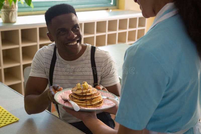 Waitress Serving Breakfast To Man Stock Image - Image of consumer ...