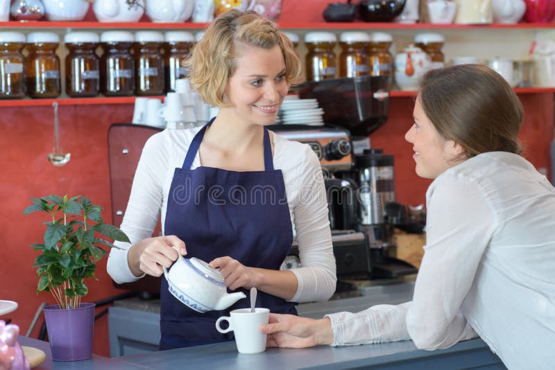 Waitress Serving Cup Coffee To Customer in Cafe Stock Photo - Image of ...