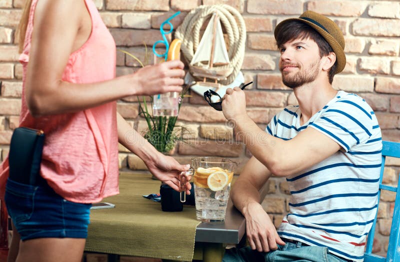 Waitress Serving Young Man in Bar Stock Image - Image of horizontal ...