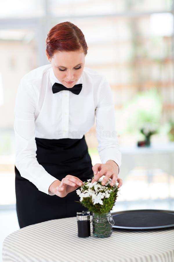 Waitress setting table stock image. Image of modern, looking - 28637281
