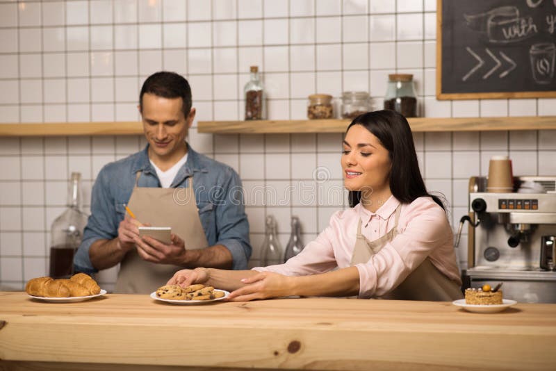 Waitress Taking Cookies on the Plate from Table Stock Photo - Image of ...