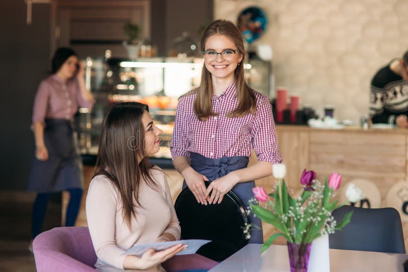 Waitress Taking Order from Her Customer in a Cafe Stock Image - Image ...