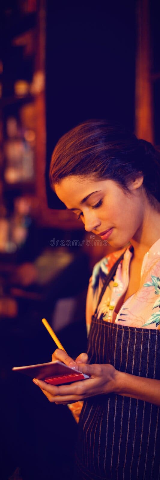 Waitress Taking an Order on Notepad at Counter Stock Photo - Image of ...