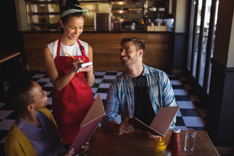 Waitress Taking Order at Restaurant Stock Photo - Image of interacting ...
