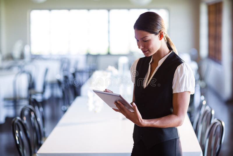 Waitress writing notes stock photo. Image of hospitality - 77688290
