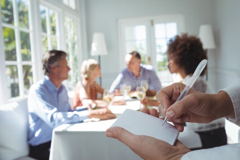 Waitress Writing Down Customers Order Stock Image - Image of writing ...