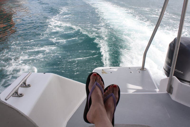 In the Wake stock photo. Image of catamaran, feet, grenada - 66794486