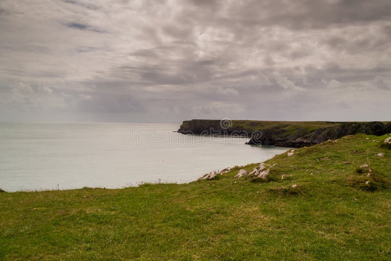 Coast with Beach and Monuments, Wales Stock Image - Image of current ...