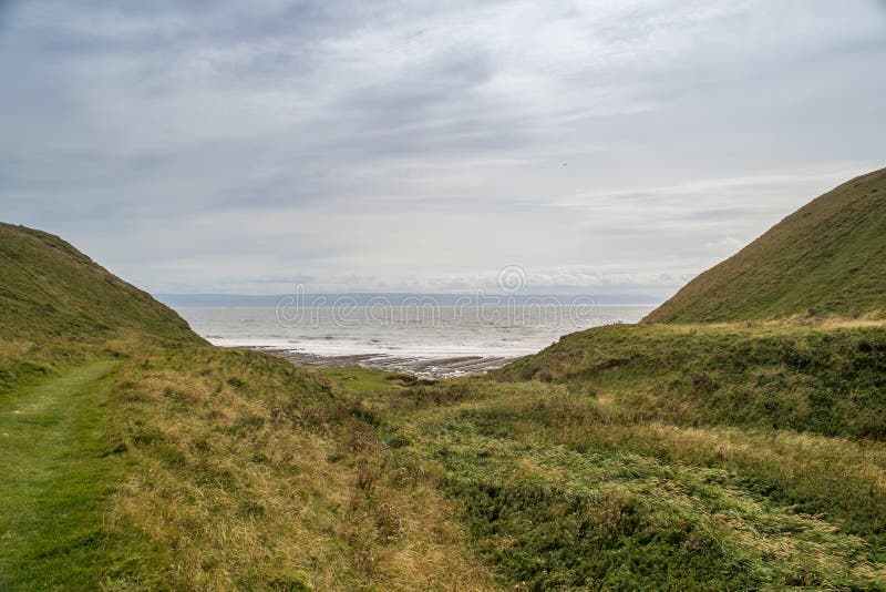 Coast with Beach and Monuments, Wales Stock Photo - Image of monuments ...