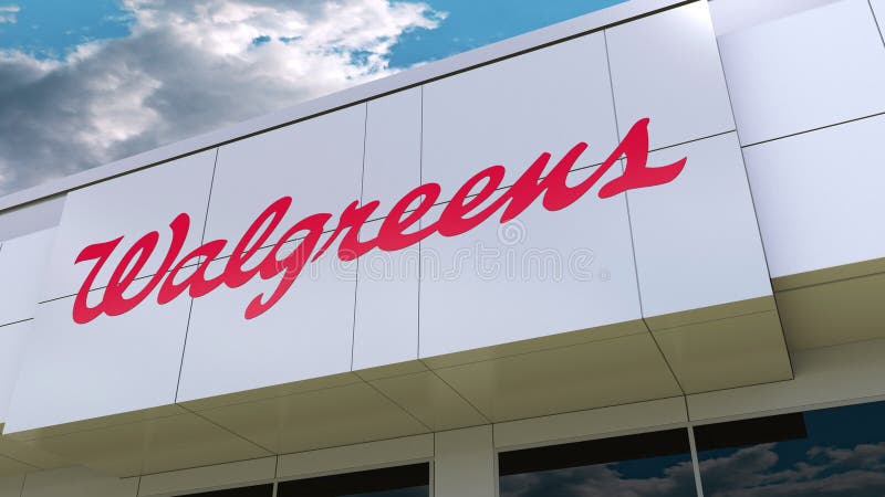 Walgreens Logo on the Glass Against Blurred Business Center. Editorial ...