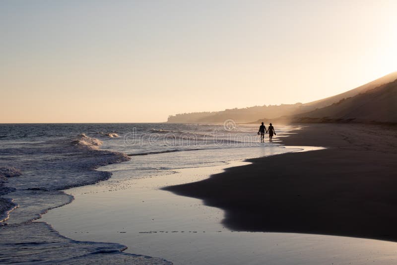Walk on the beach stock photo. Image of surf, wave, esquinzo - 135060210