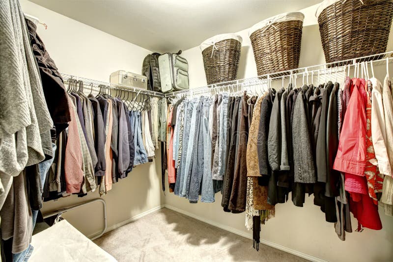 Walk-in Closet with Clothes Stock Image - Image of real, clothes: 43150019