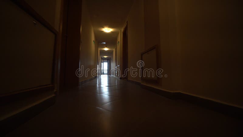 Walk through Hotel Corridor Stock Image - Image of company, cinematic ...