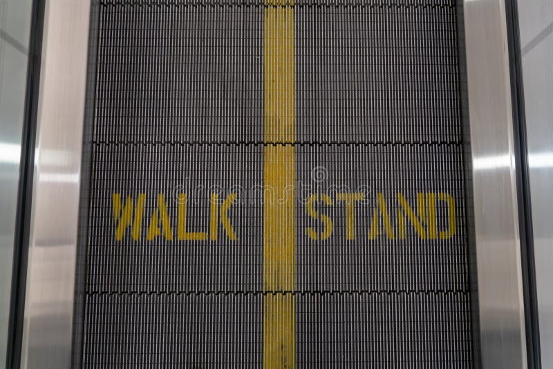 Walk Stand Sign on a Moving Walkway Stock Photo - Image of walk ...