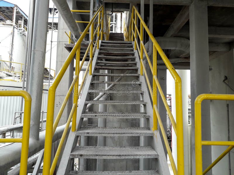 Industrial Walk Way with Yellow Handrail and Steel Structure Roof ...