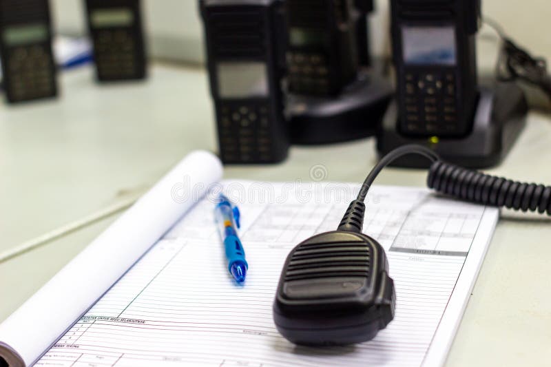 Walkie-Talkie Communication Devices with Pen and Data Sheet Prepared ...