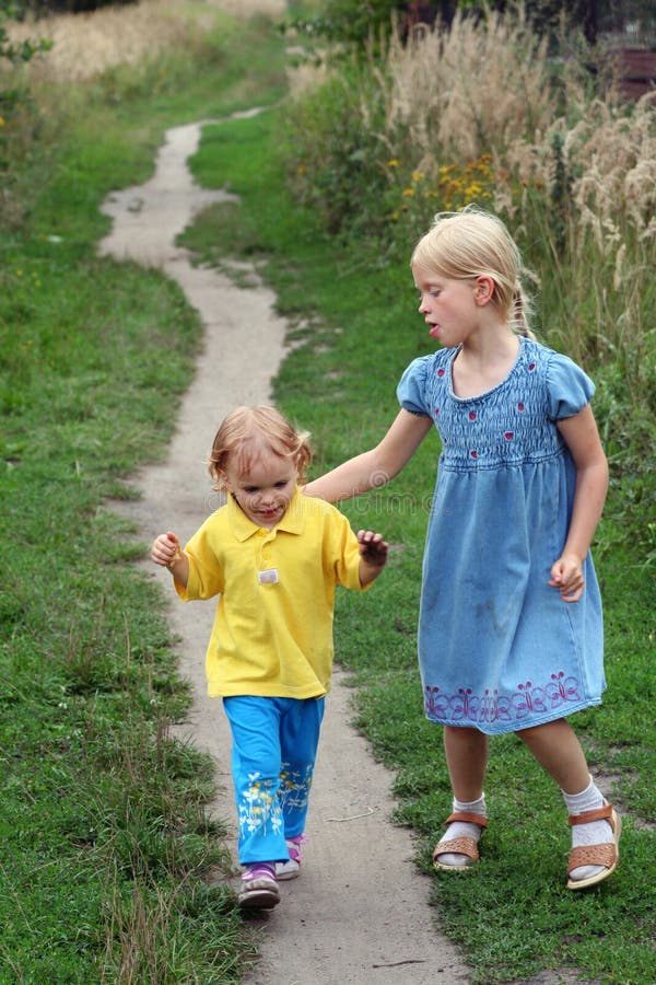 Children Walking in the Park Editorial Image - Image of grass, hands ...