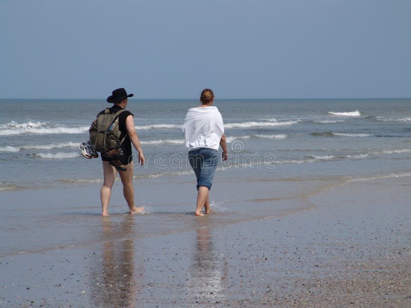 Walking at the beach stock photo. Image of beach, walking - 767882