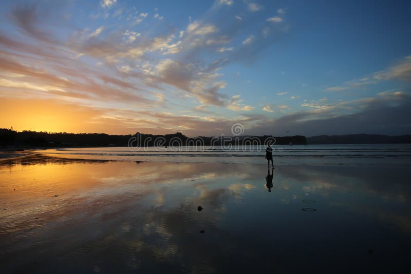 Walking on the Beach at Sunset Stock Photo - Image of clouds, teenager ...