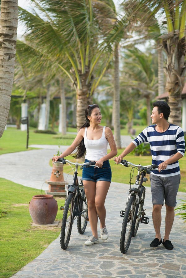 Walking with bicycles stock photo. Image of healthy, date - 43962242