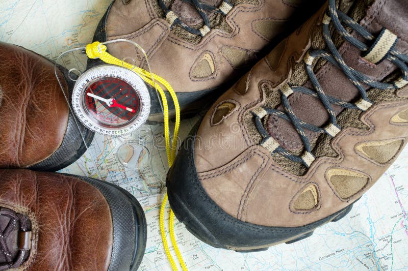 Walking Boots on a Map, with Compass. Close Up. Stock Photo - Image of ...