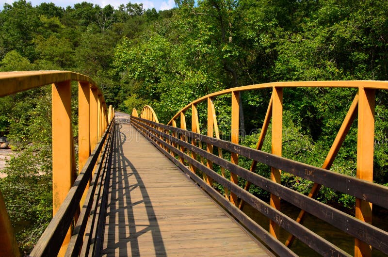 Walking Bridge Over River in the Woods Stock Image - Image of park ...