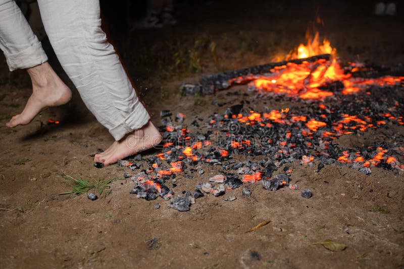 Walking on the Burning Cinders Close-up Side View. Stock Image - Image ...