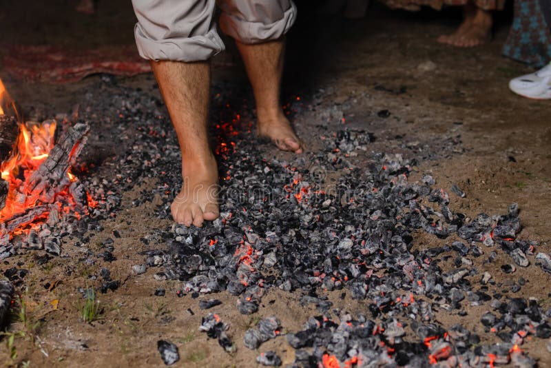 Walking on the Burning Cinders Close-up Side View. Stock Image - Image ...