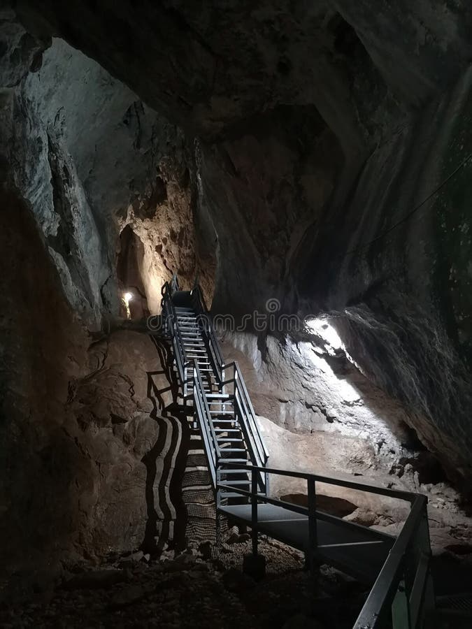 Walking in the cave stock image. Image of entrance, dark - 231085103
