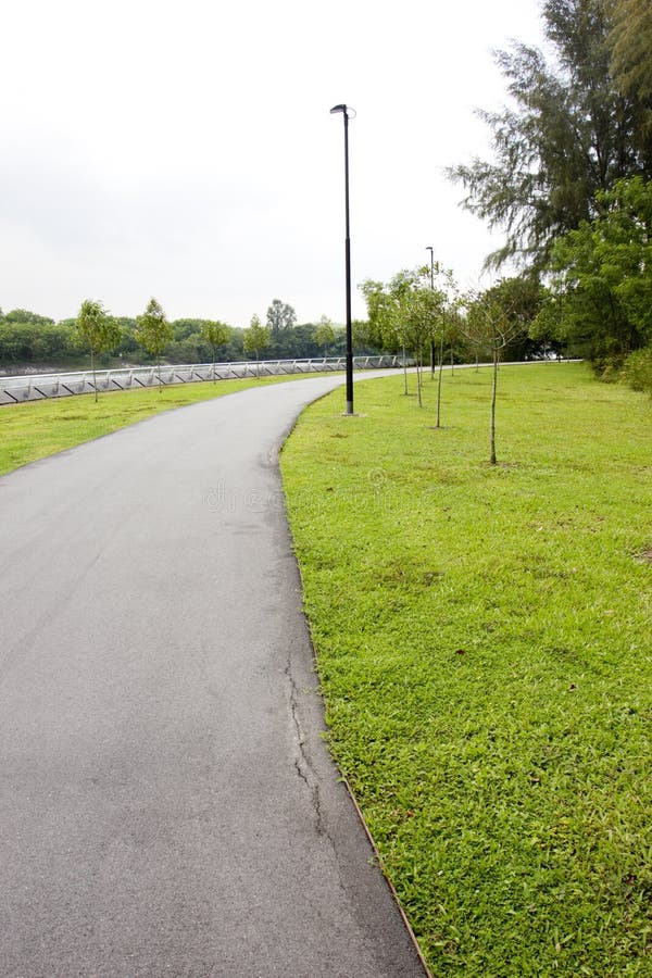 Walking and cycling path stock photo. Image of green - 46544742