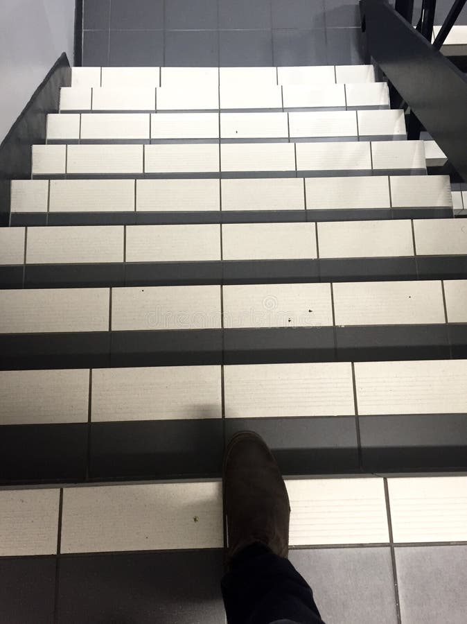 Walking down the stairs stock image. Image of foot, stairs - 57615657