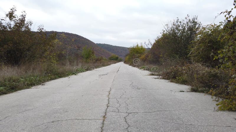 Walking through Empty Old Asphalt Road in Countryside. Stock Video ...