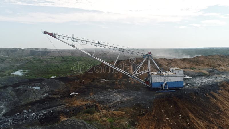 Walking Excavator Working at Coal Mine. Dragline Excavator Loads Soil ...