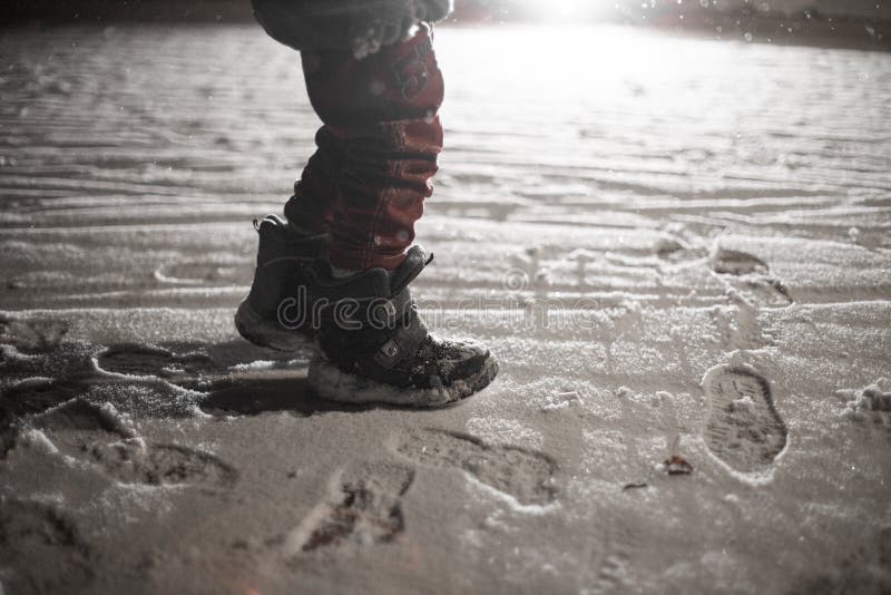 Walking feet in the snow. stock photo. Image of bright - 210312578
