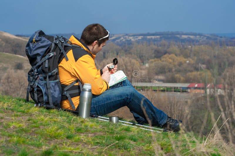 Walking Hiker Looking at Map02 Stock Photo - Image of hike, compass ...