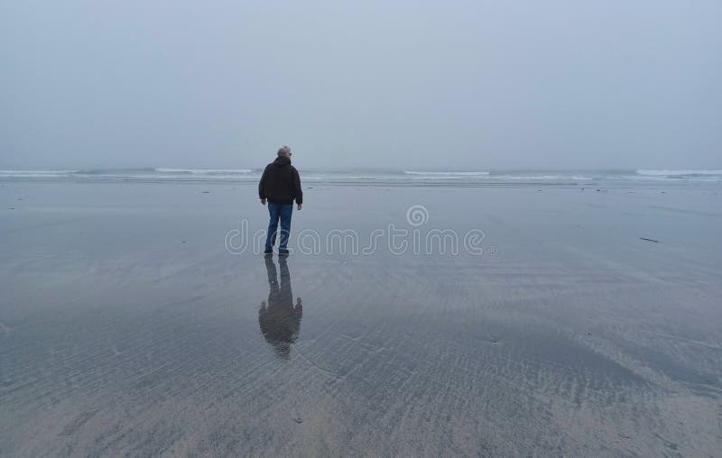 Walking at Long Sands in the Mist Stock Image - Image of ocean, shore ...