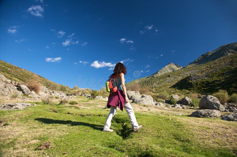 Walking over small stream stock photo. Image of explorer - 12440788