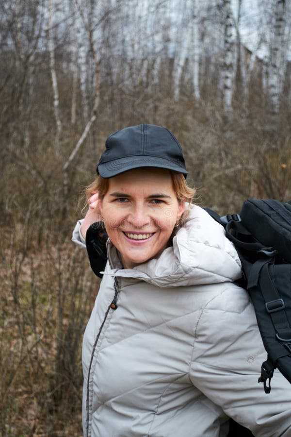 Happy girl with a backpack stock image. Image of woman - 104517647