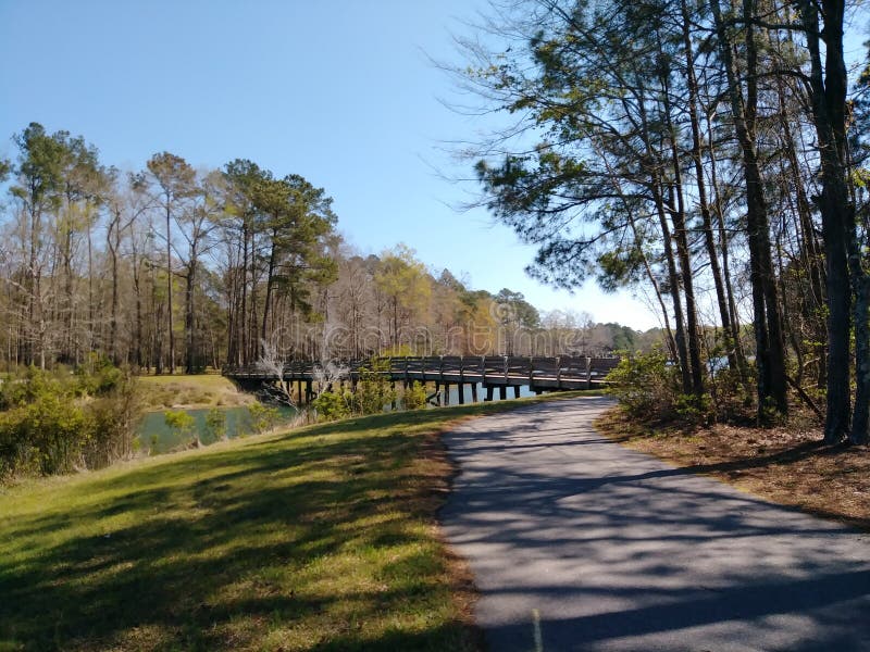 Bridge over lake stock photo. Image of lake, trees, outdoors - 112470684