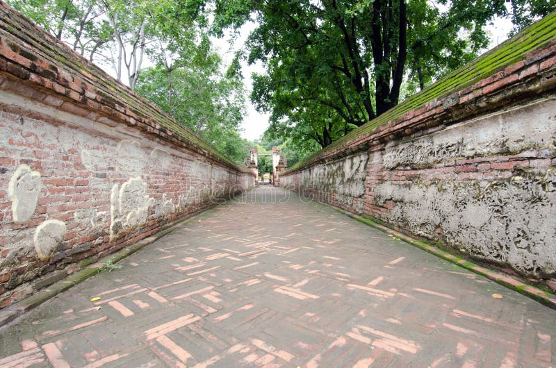 Walking Path with Brick Wall on the Sideway Stock Photo - Image of ...