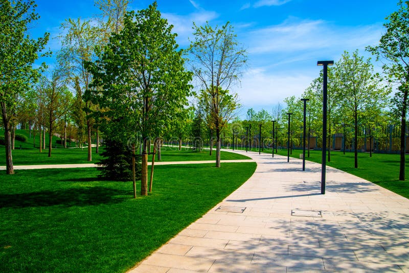 Walking Path in a City Park with Urban Lights or Lanterns Stock Photo ...