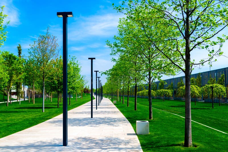 Walking Path in a City Park with Urban Lights or Lanterns Stock Photo ...