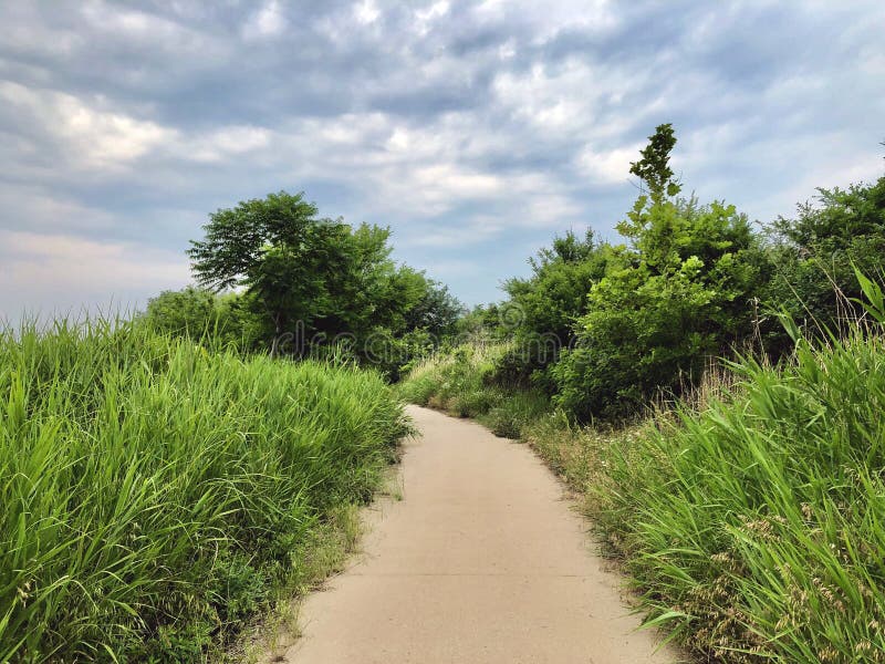 Walking on a cloudy day stock image. Image of healing - 150680905